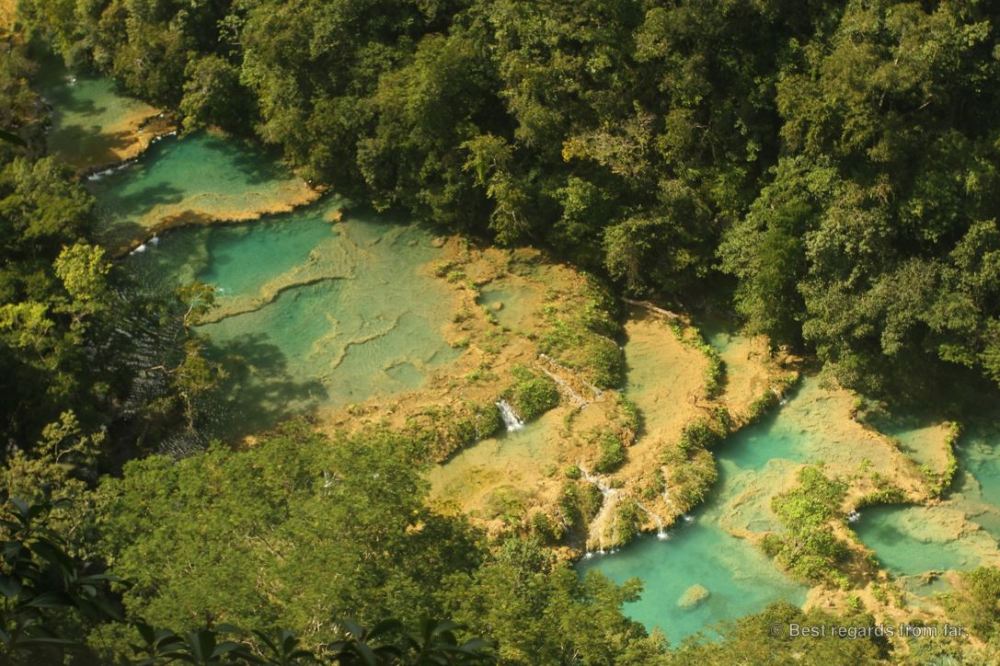 Jumping into the emerald limestone pools of Semuc Champey, Guatemala ...