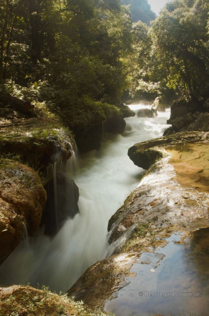 Jumping into the emerald limestone pools of Semuc Champey, Guatemala ...